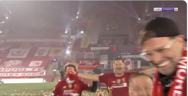 (Video) Klopp mobbed by coaching staff during interview and it's beautiful