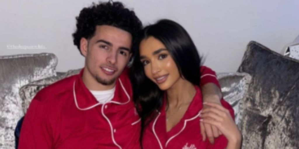 Curtis Jones pictured with his partner in matching pyjamas