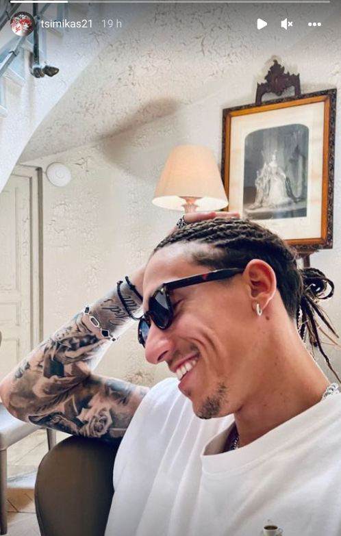 Kostas Tsimikas unveils his new hair style