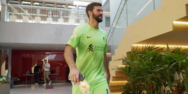 Alisson Becker turns heads as he struts into media day like a model