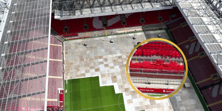 Seats removed on the Anfield Road End as grass covered for major works