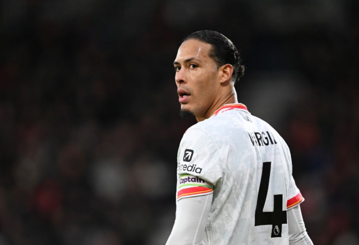 Van Dijk's agents spotted next to Richard Hughes in Anfield directors' box