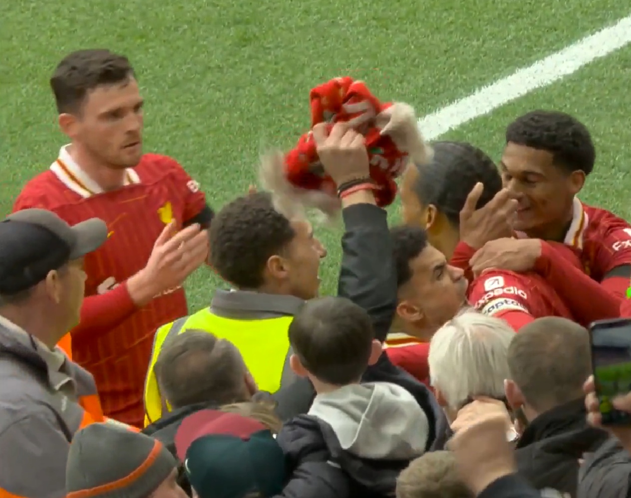 Watch huge contrast in Robertson's reactions to two late goals at Anfield